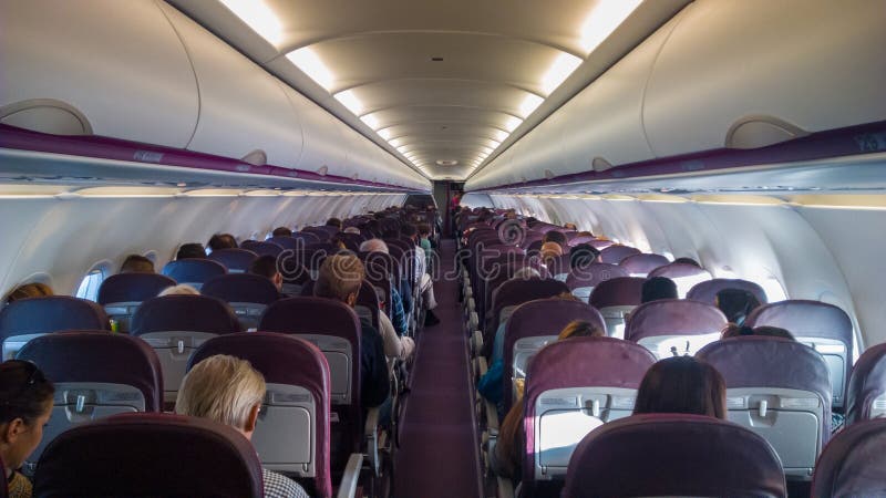 People are Sitting in the Plane Wizair Ljubljana Slovenia 22-11-2014 ...