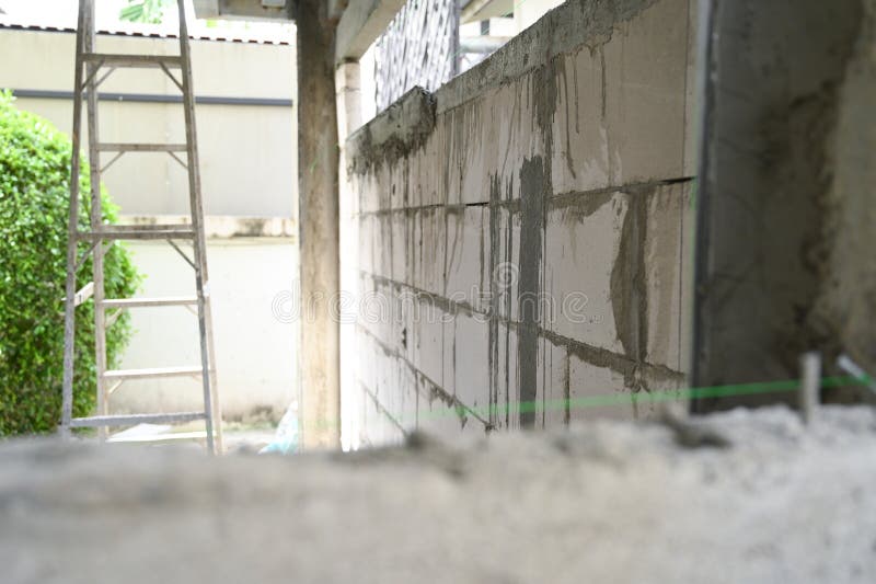 Interior Construction Industry with Steel Ladder Cement Wall Texture ...