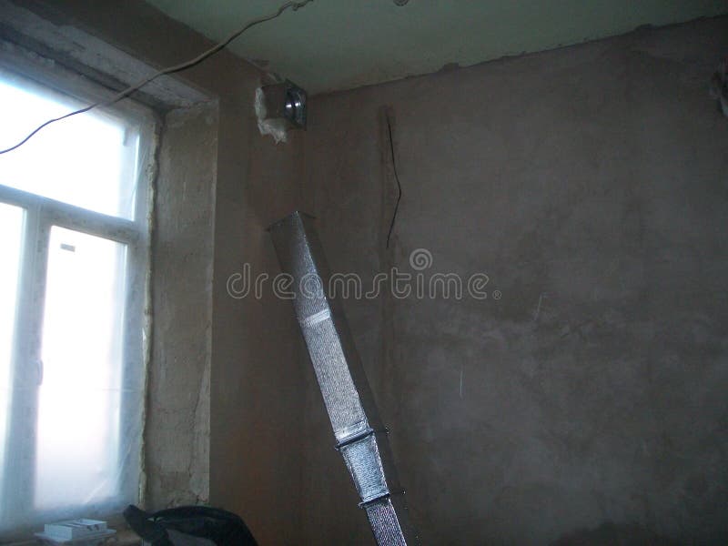 Interior Construction Project Showcasing Bare Walls and Ventilation ...