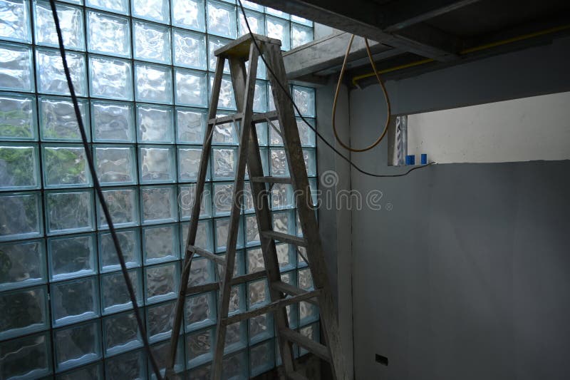 Construction Site Industry with Glass Block and Steel Ladder Stock ...