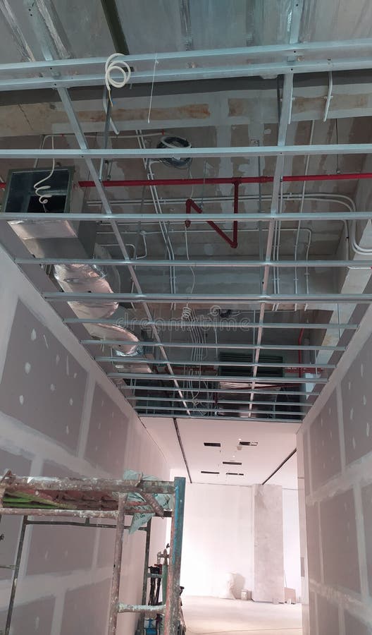 Interior Corridor Construction Work with Ceiling and Electrical ...