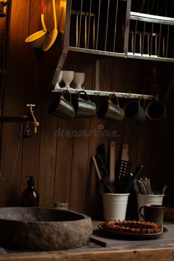 The Interior of a Country House. Rustic Kitchen in a Cozy Cabin Stock ...