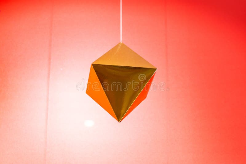 Interior Decor: Golden Hexagon Hanging on a String Stock Photo - Image ...