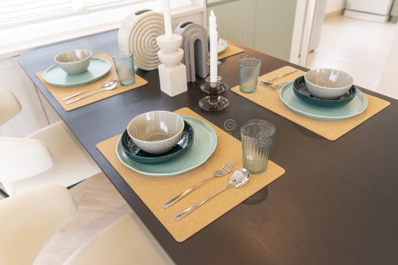 Interior Design of Modern Dining Room and Green Plate Setting on Table ...