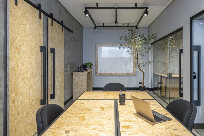 Interior Design of a Office with Notebook Osb Table and Sliding Doors ...
