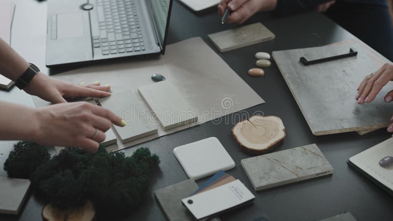 Interior Design Studio. Designers with Architects and Clients Select ...