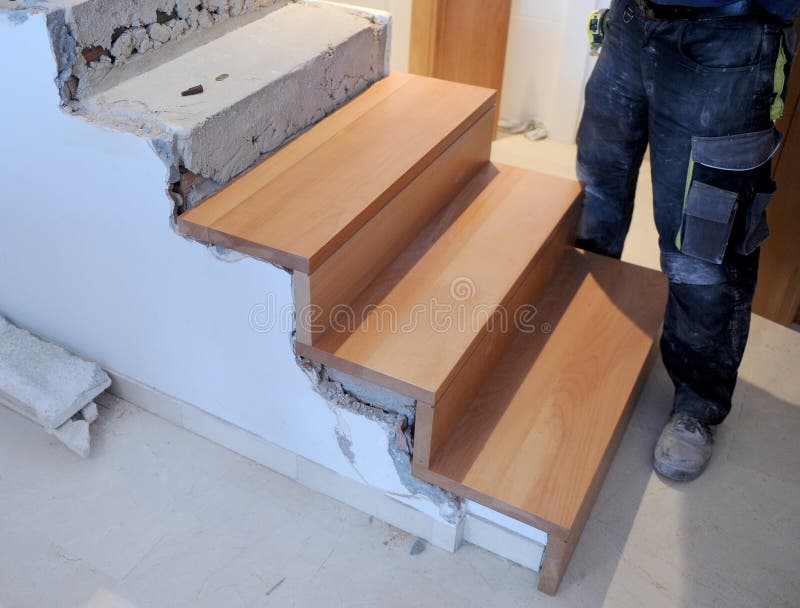 Carpenter Placing the Beech Wood Steps of the Staircase of a Duplex ...