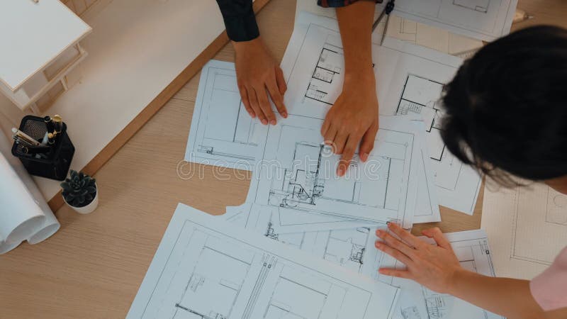 Skilled Interior Designer Team Focusing on Their Performance ...