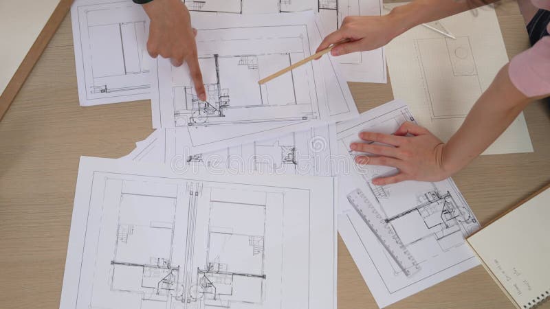 Skilled Interior Designer Team Focusing on Their Performance ...