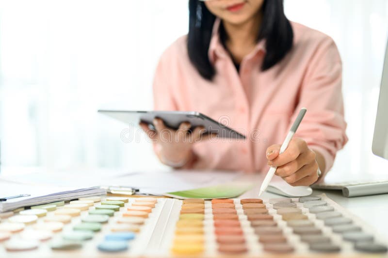 Interior Designer Holding Digital Tablet Selecting Color Tones for a ...