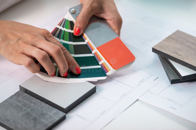 An Interior Designer Meticulously Curates Color Samples, Including ...