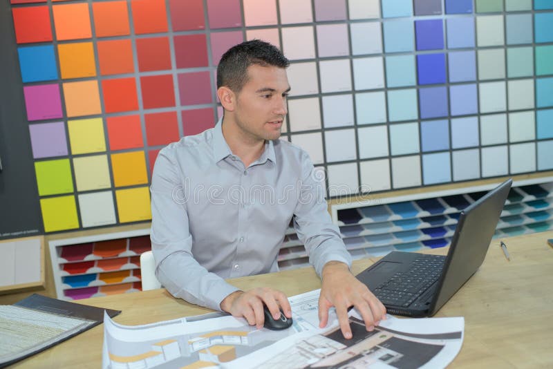 Interior Designer Sat at Desk Stock Image - Image of home, plan: 268744199