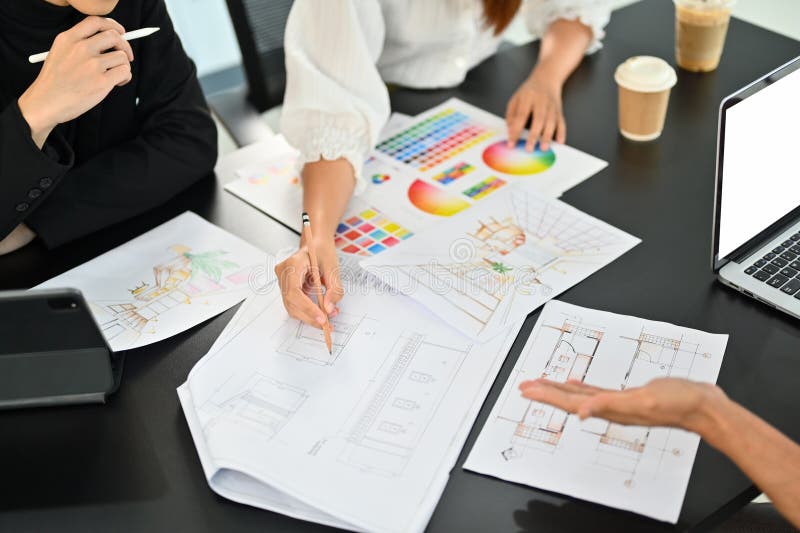 Interior Designer Team Brainstorming and Planning Construction Project ...