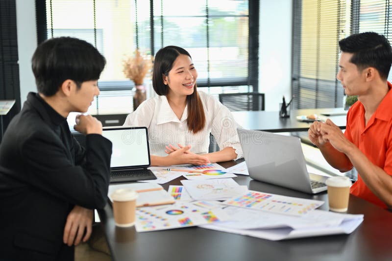 Interior Designer Team Brainstorming, Selecting Colors for Building and ...