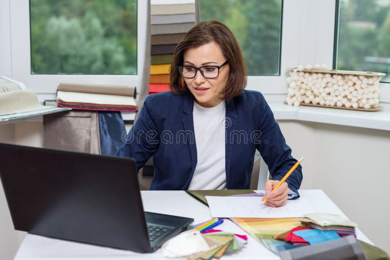 Interior Designer, at the Workplace in the Office Stock Photo - Image ...