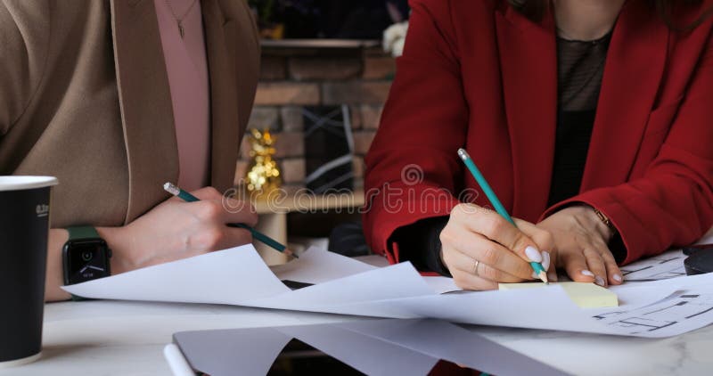 Interior Designers Collaborating on Project, Discussing Layout and ...