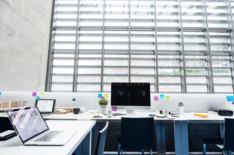 An Interior of Desks with Computer in Modern Spacious Office. Stock ...