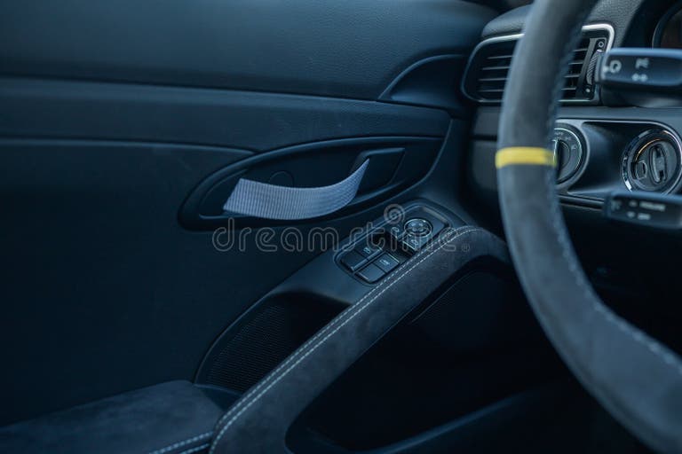 Interior Door Panel of a Luxury Car Showing a Fabric Door Handle and ...