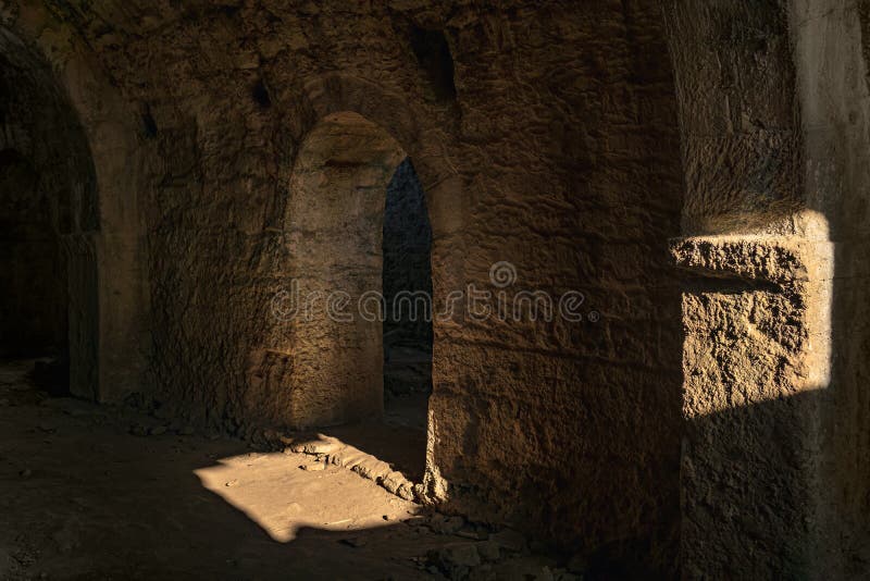 Interior of a Dungeon of Some Ancient Ruins Stock Image - Image of door ...