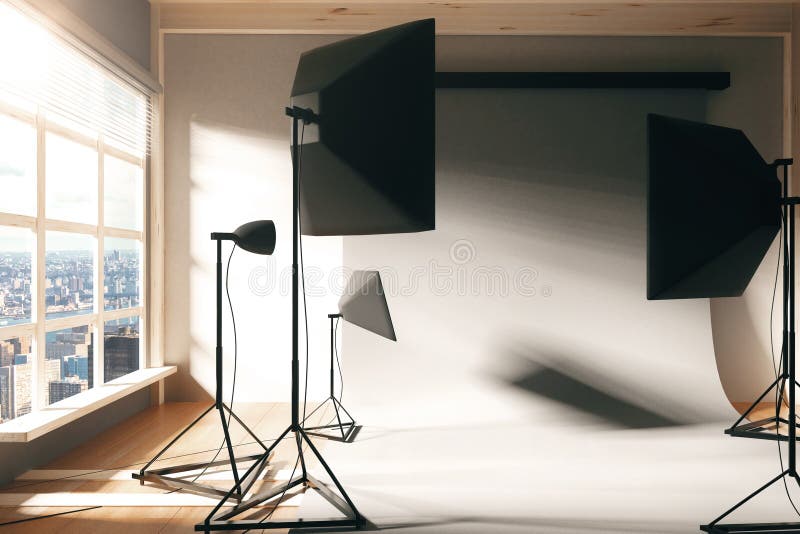 Empty Photo Studio With Equipment And White Background At Sunset Stock ...