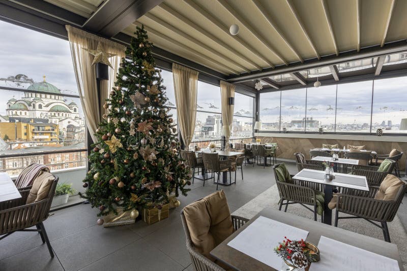 Interior of an Empty Restaurant with Christmas Tree Editorial Stock ...
