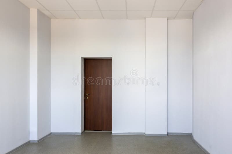 Interior of an Empty Room with a Closed Door Stock Image - Image of ...