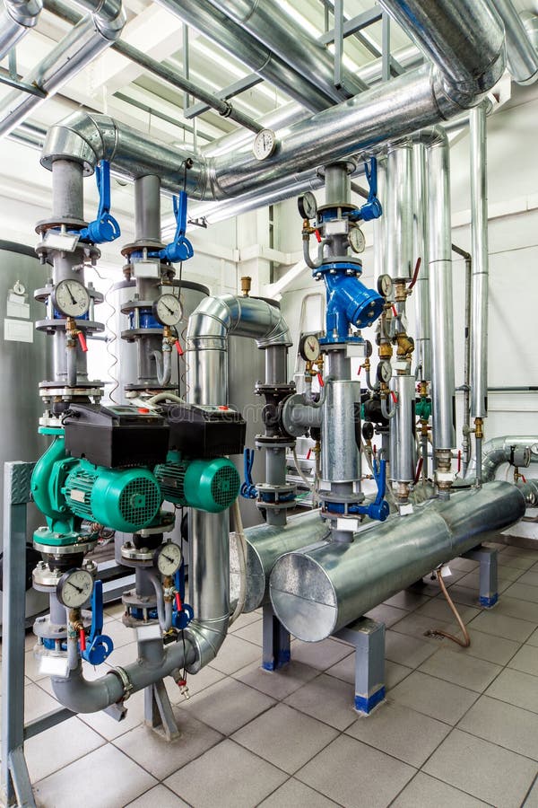 Interior Gas Boiler Room with Multiple Pumps and Piping Stock Image ...