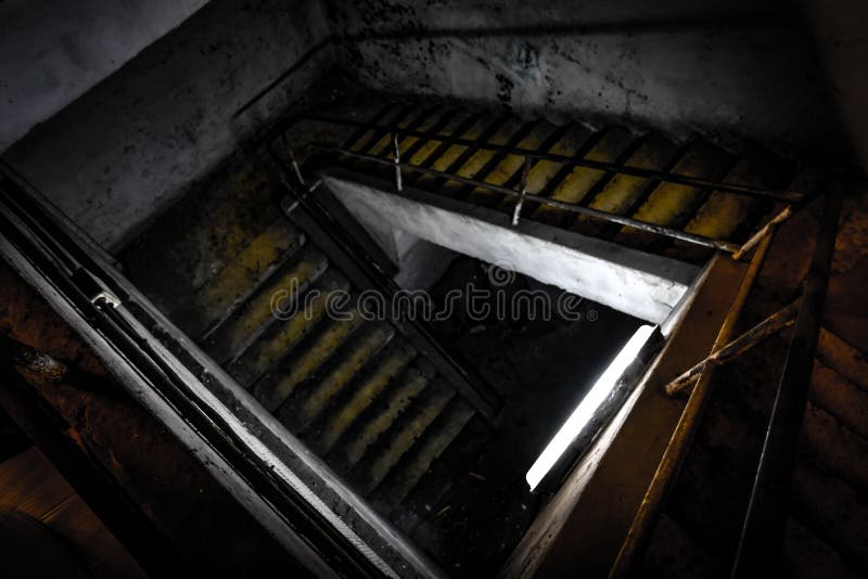 Interior High Angle Shot of a Staircase Going Down Stock Image - Image ...