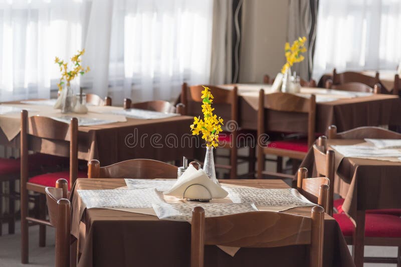Interior of a Hotel Restaurant or Dining Room with Yellow Flowers Stock ...