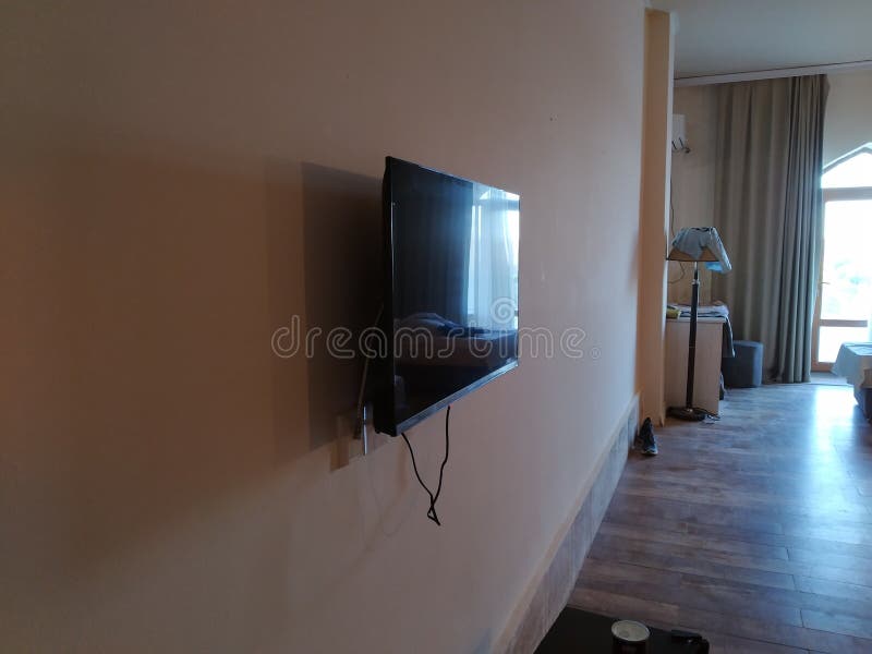 Interior of a Hotel Room with a TV Set on the Wall Stock Image - Image ...