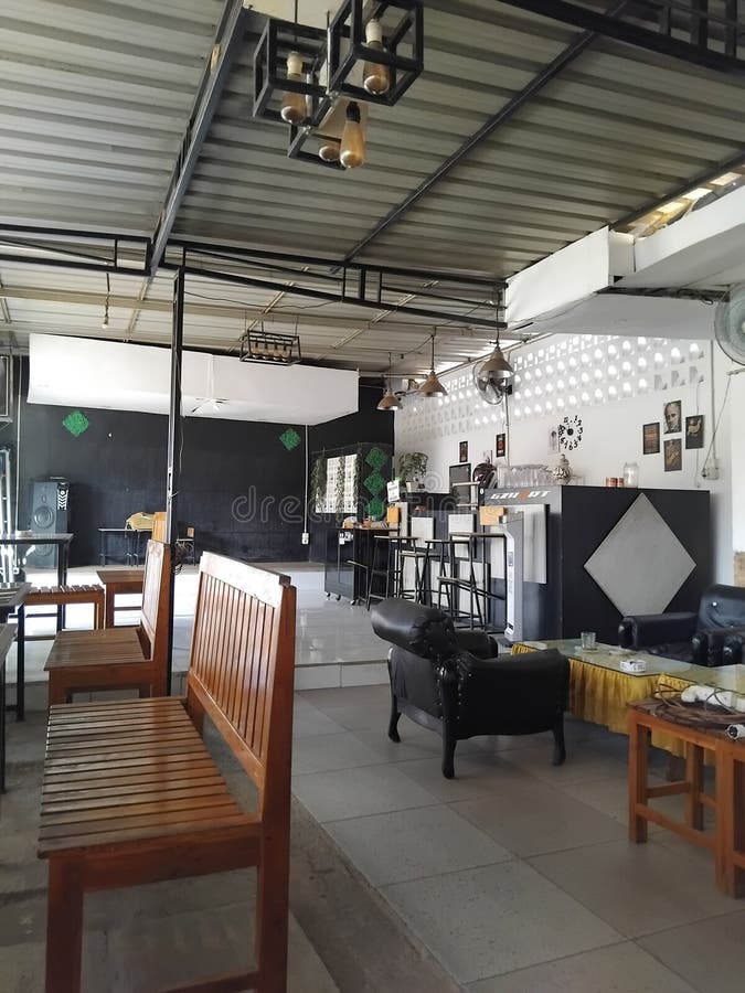 The Interior of an Industrial Style Cafe with a Combination of Vintage ...