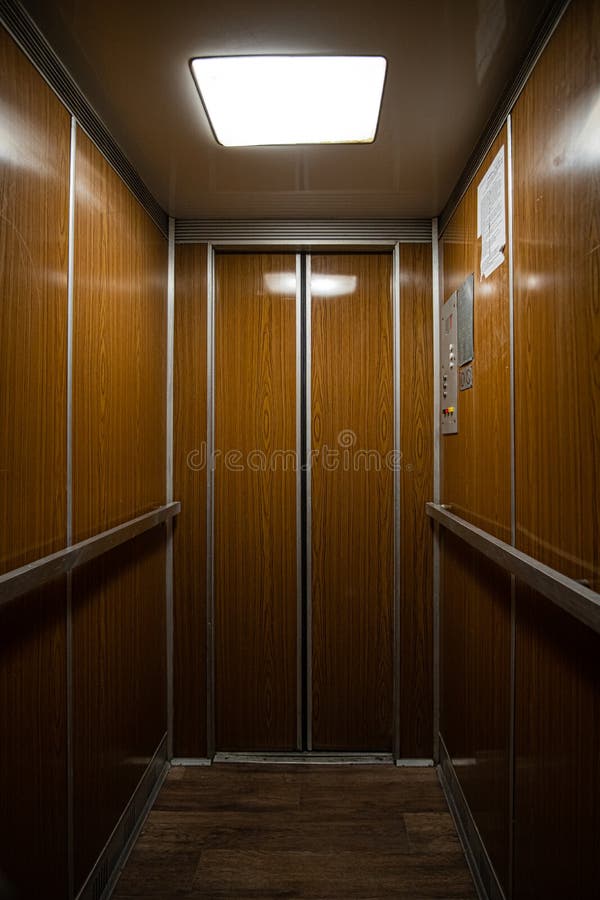 Interior Inside a Closed Clean Old Soviet Elevator Car Lined with Wood ...