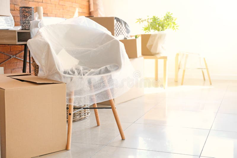 Interior Items and Packed Carton Boxes in Room. Moving House Concept ...