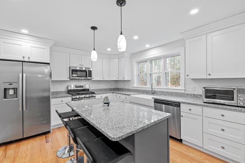 Interior of a Kitchen Set with a Dinning Set Stock Photo - Image of ...