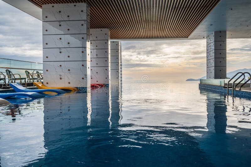Interior of Luxury Skyscraper Hotel with Rooftop Pool Overlooking the ...