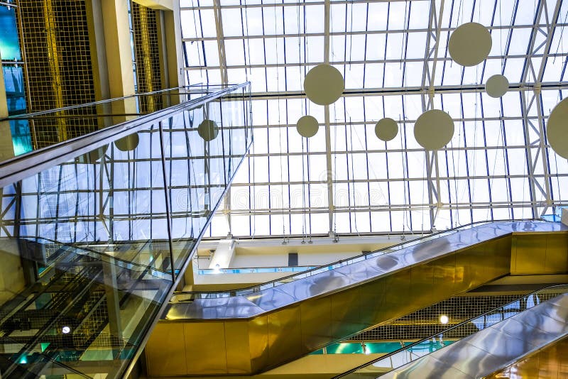 The Interior Of A Modern Building With An Elevator. Glass Roof, Glass ...