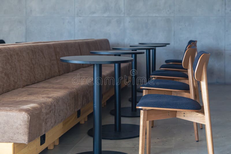 Interior of a Modern Cafe with Sofas, Chairs and Tables. Stock Image ...