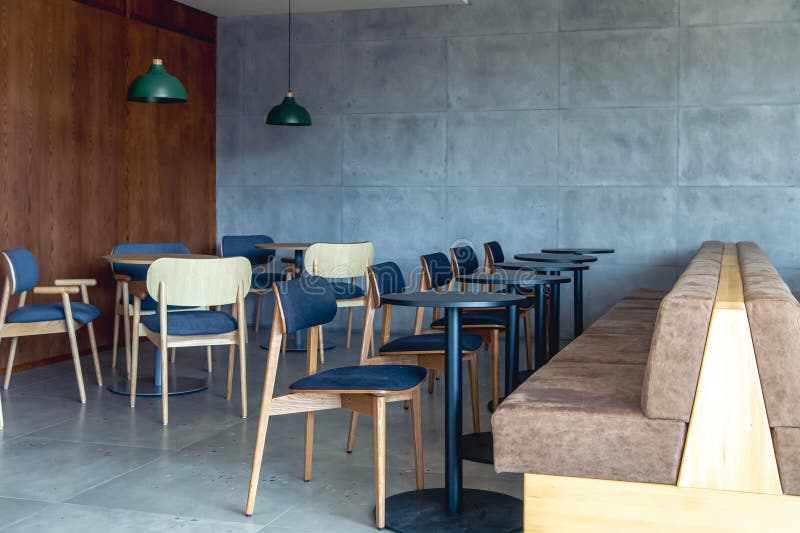 Interior of a Modern Cafe with Sofas, Chairs and Tables. Stock Image ...