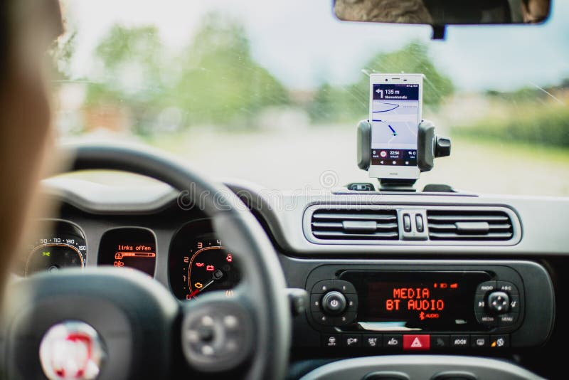 Interior of a Modern Car on a Sunny Day. Smartphone on Mobile Mount ...
