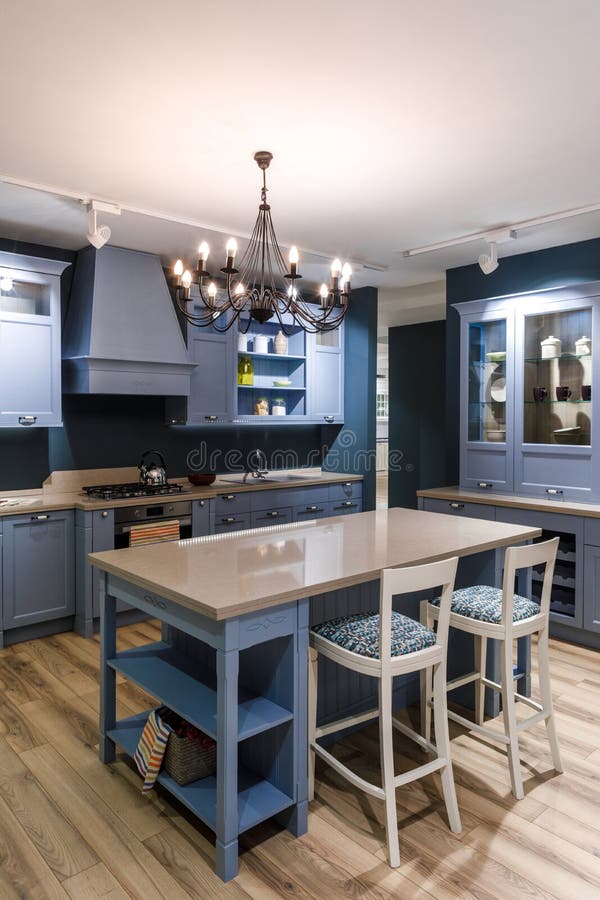 Interior of Modern Kitchen with Chandelier Over Table Stock Image ...