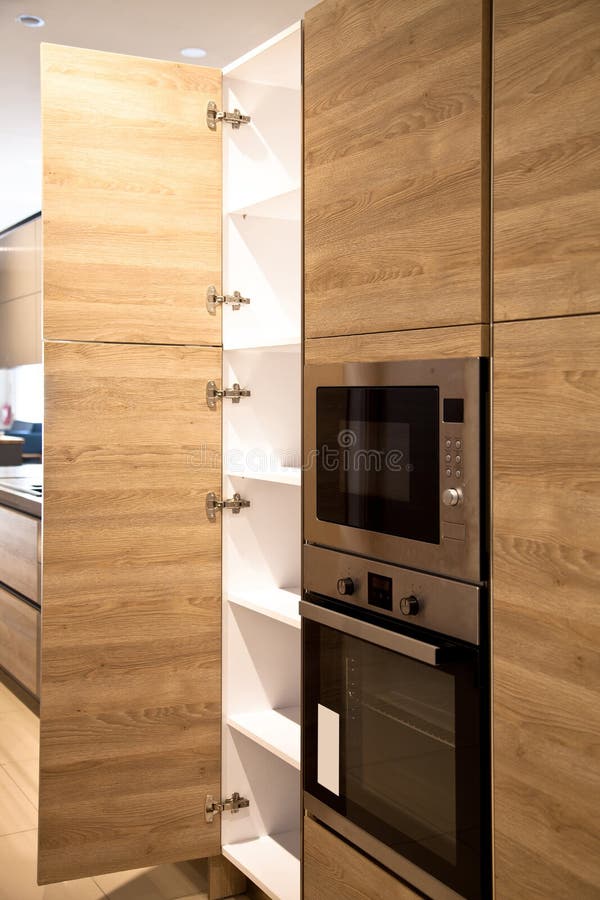 Interior of Modern Kitchen Equipment, White and Oak Cabinets Stock ...