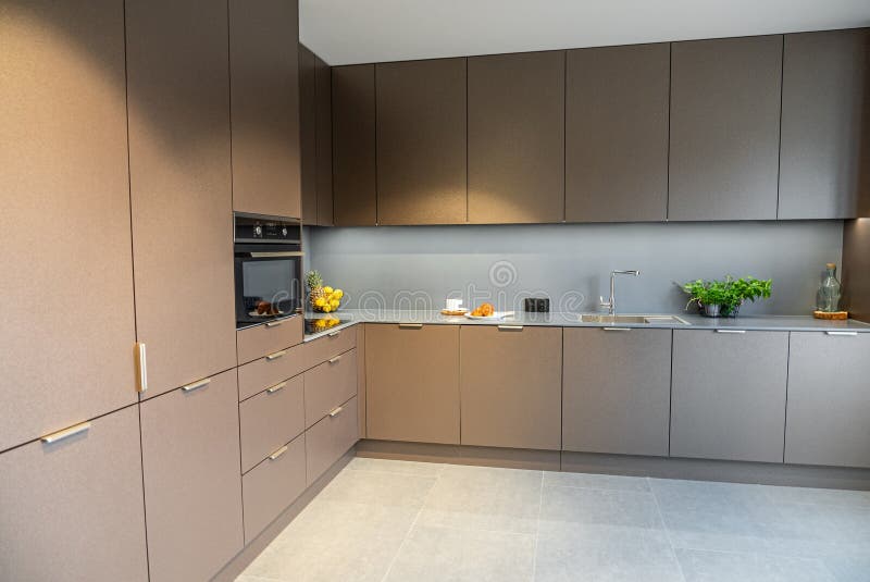 Interior of a Modern Kitchen in a New House. Dining Table and Chairs in ...