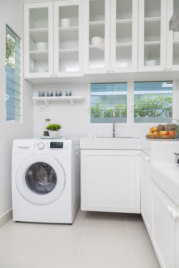 Interior of Modern Kitchen with Washing Machine. Stock Photo - Image of ...