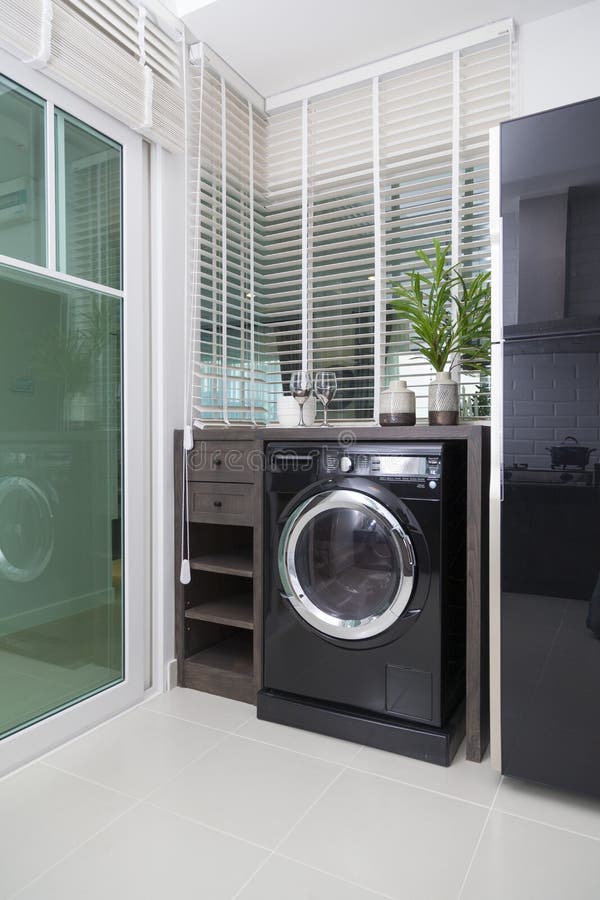 Interior of Modern Kitchen with Washing Machine. Stock Photo - Image of ...