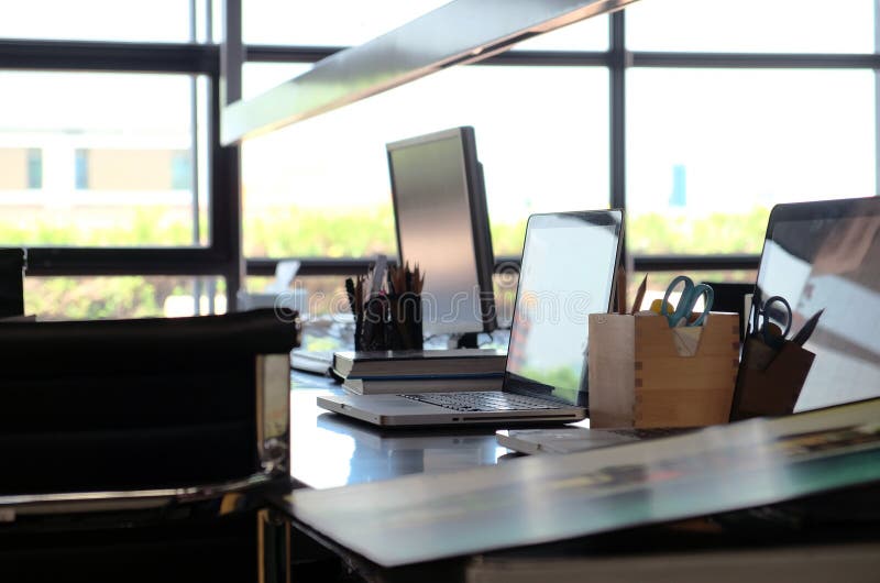Interior of a Modern Office with Computers and Documents on the Table ...
