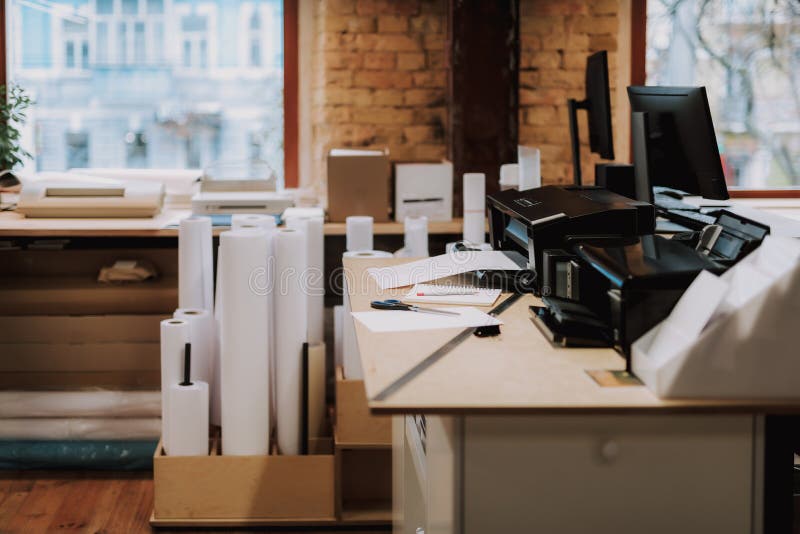 Interior of Modern Office with Desk, Printer and Stationery Stock Image ...