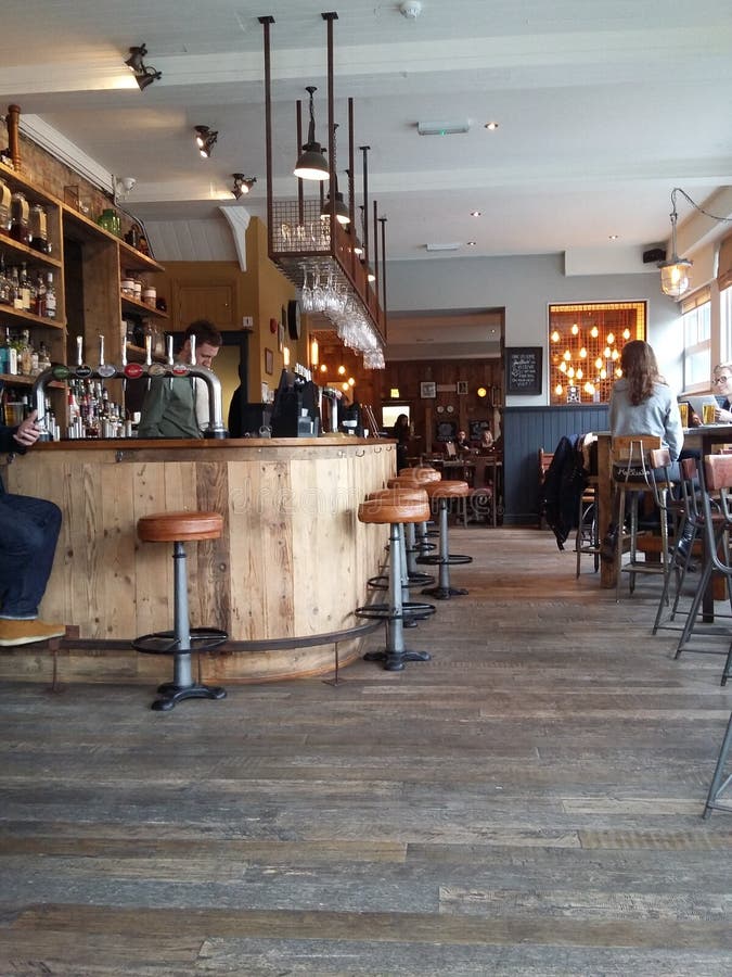 Interior of a modern pub editorial stock photo. Image of local - 86662503