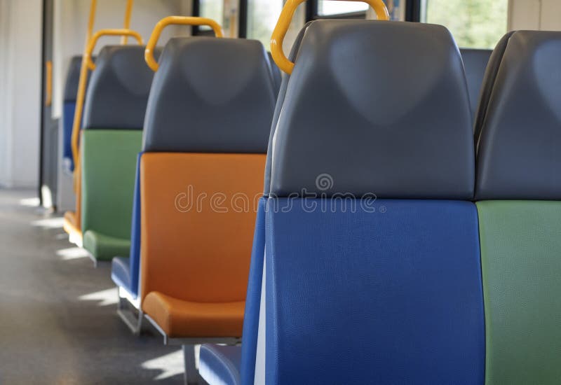The Interior of a Modern Train with Rows of Seats and a Central Aisle ...