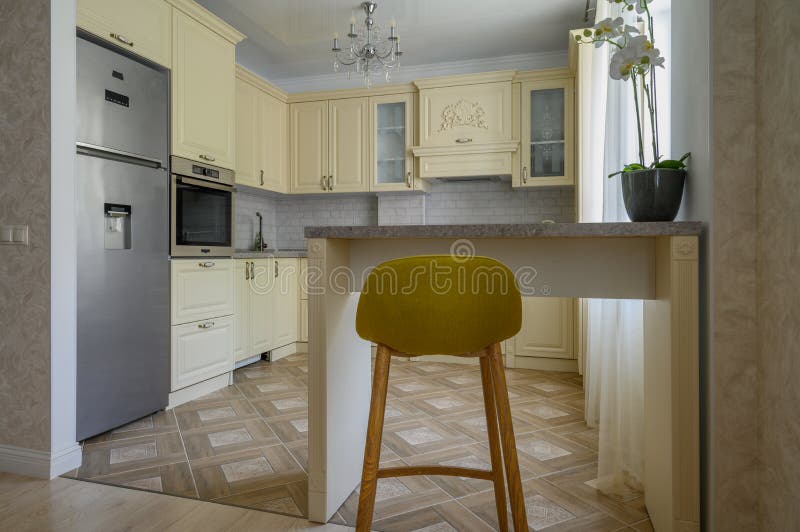 Interior of Modern Trendy Cream Colored Kitchen Stock Photo - Image of ...