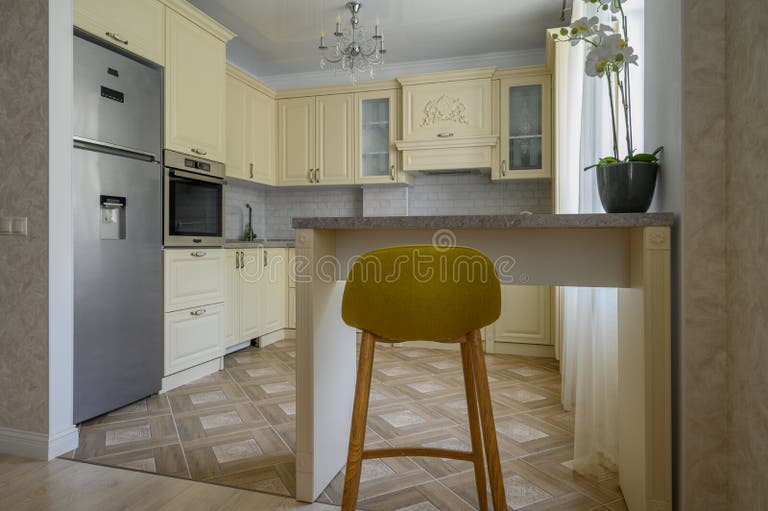 Interior of Modern Trendy Cream Colored Kitchen Stock Photo - Image of ...